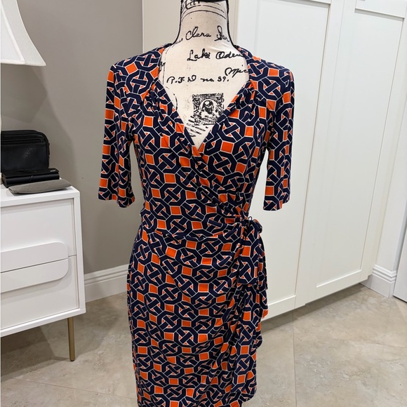 Maggy London | Dresses | Maggy London Navy And Orange Wrap Midi Dress ...